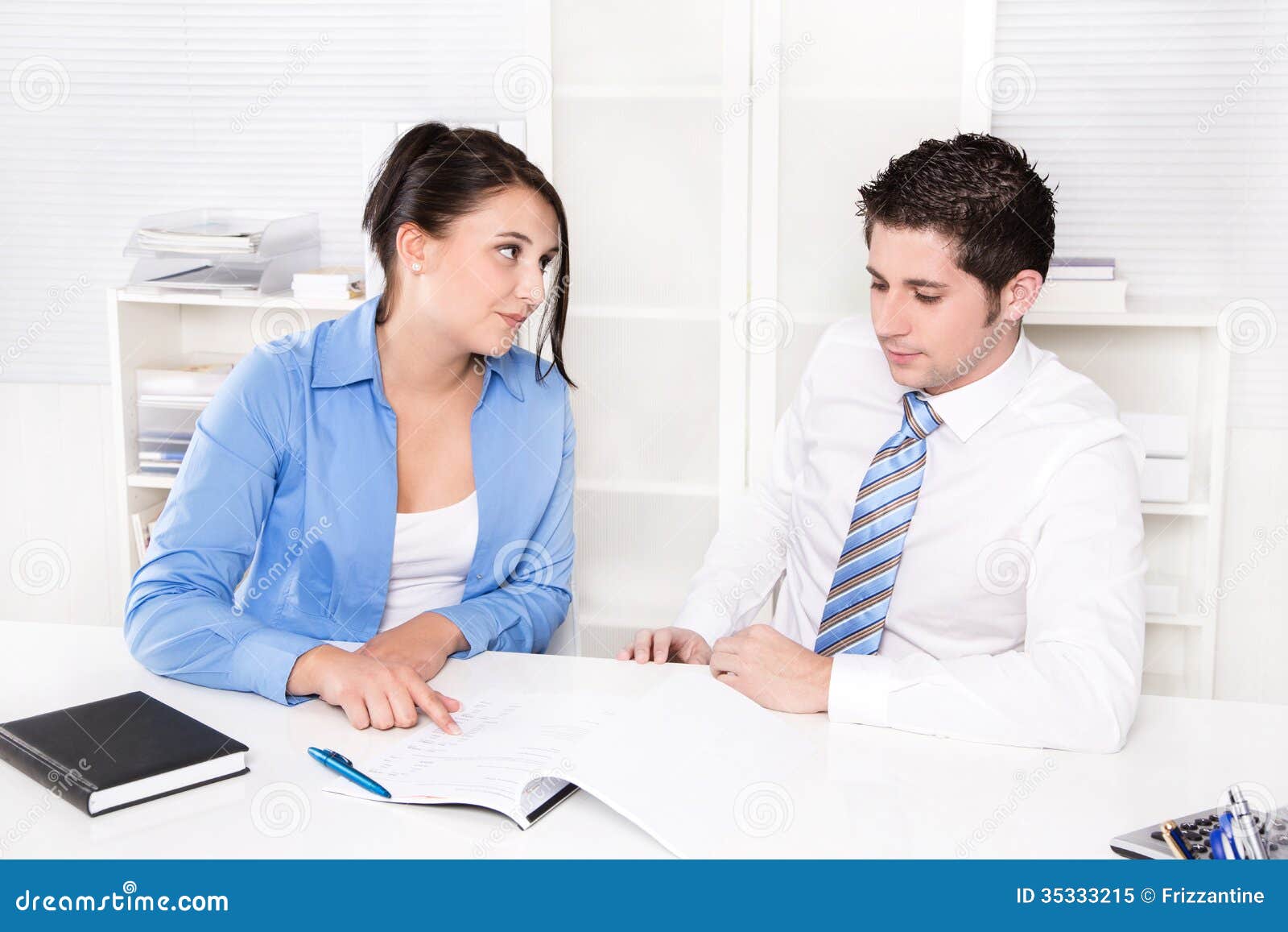 Two Caucasian Business People Working at Office. Stock Image - Image of ...