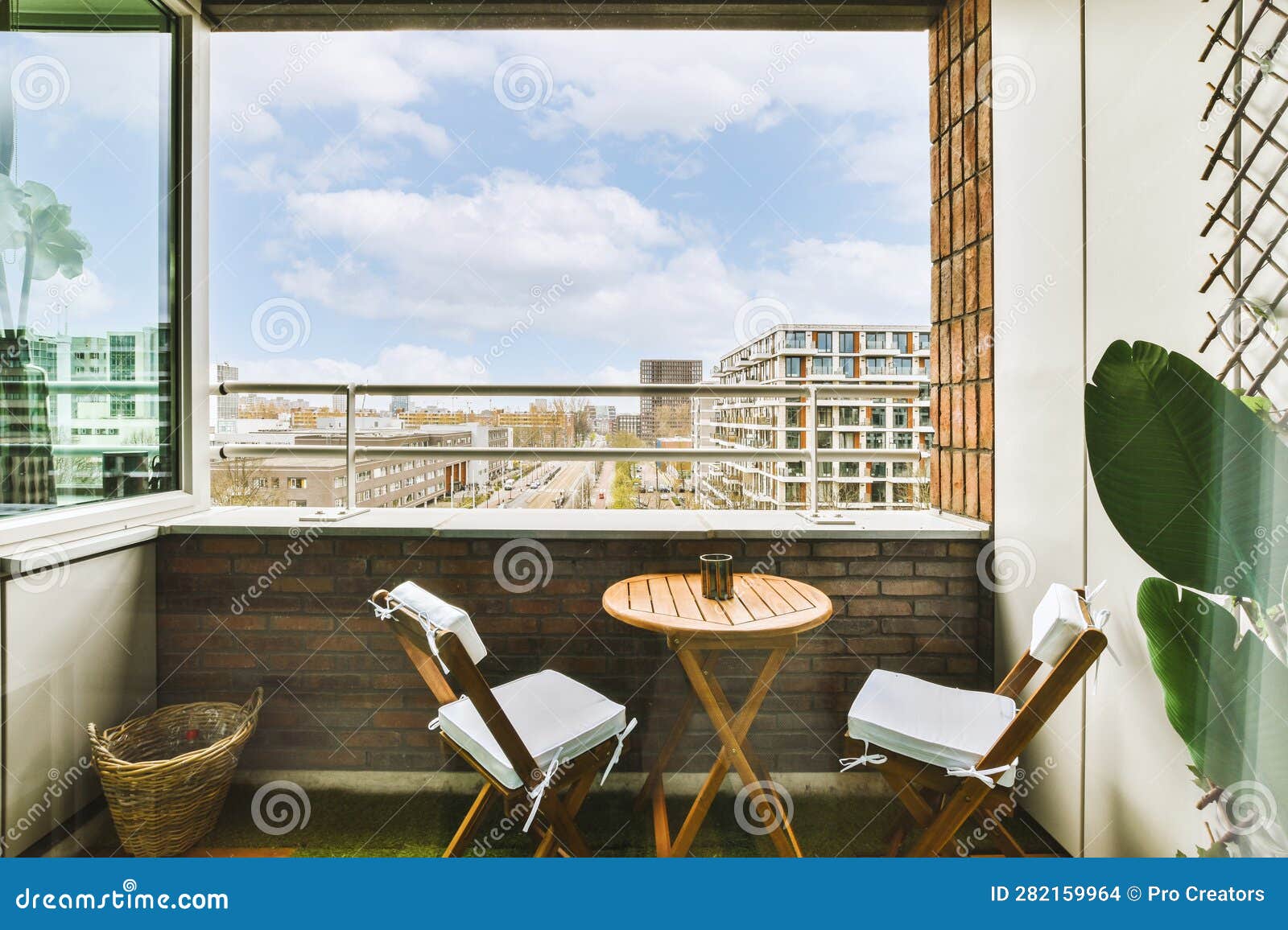 A Balcony with Two Chairs and a Table and a Stock Photo - Image of view ...
