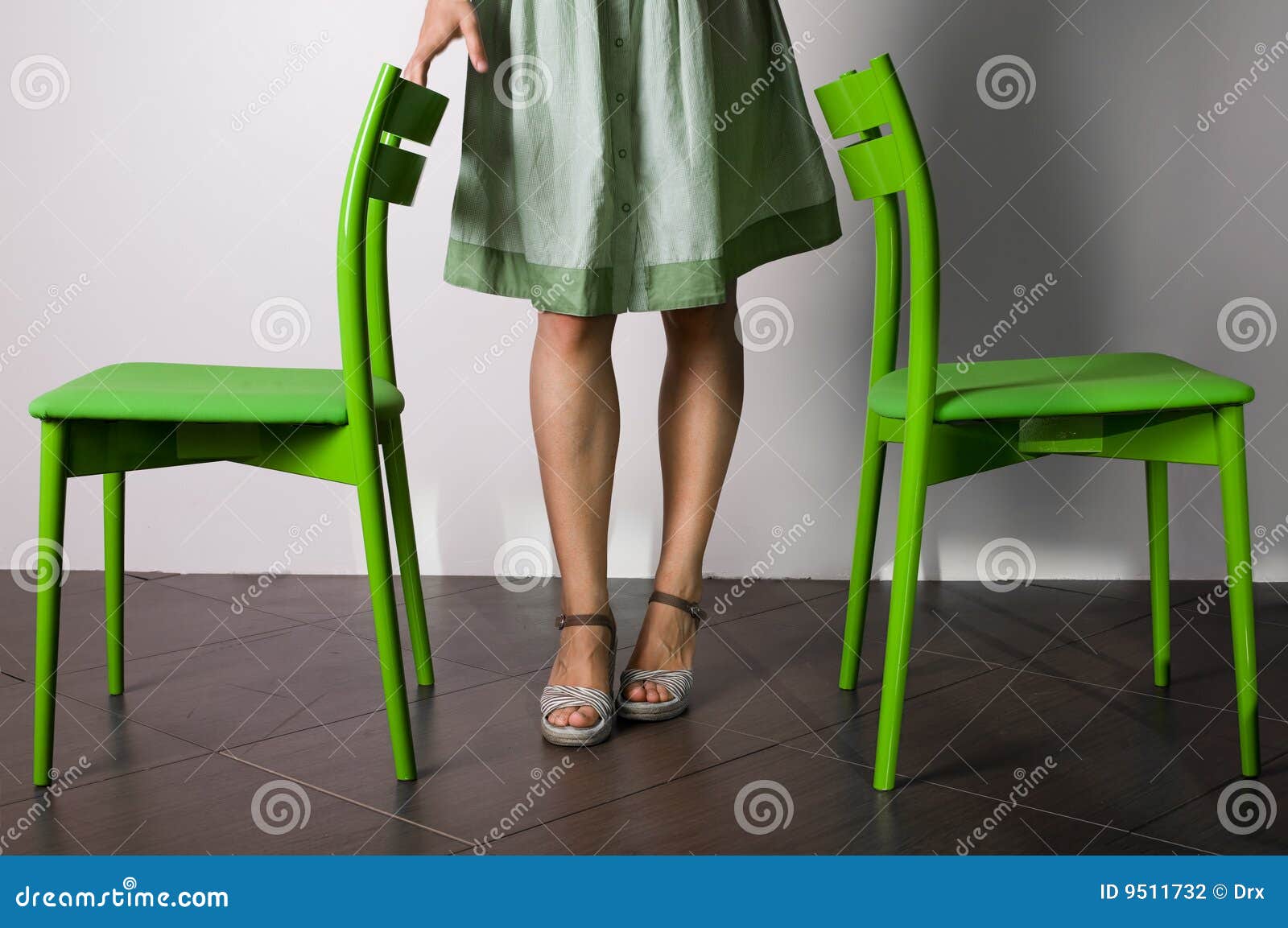 Two chairs and woman legs stock photo. Image of chairs - 9511732
