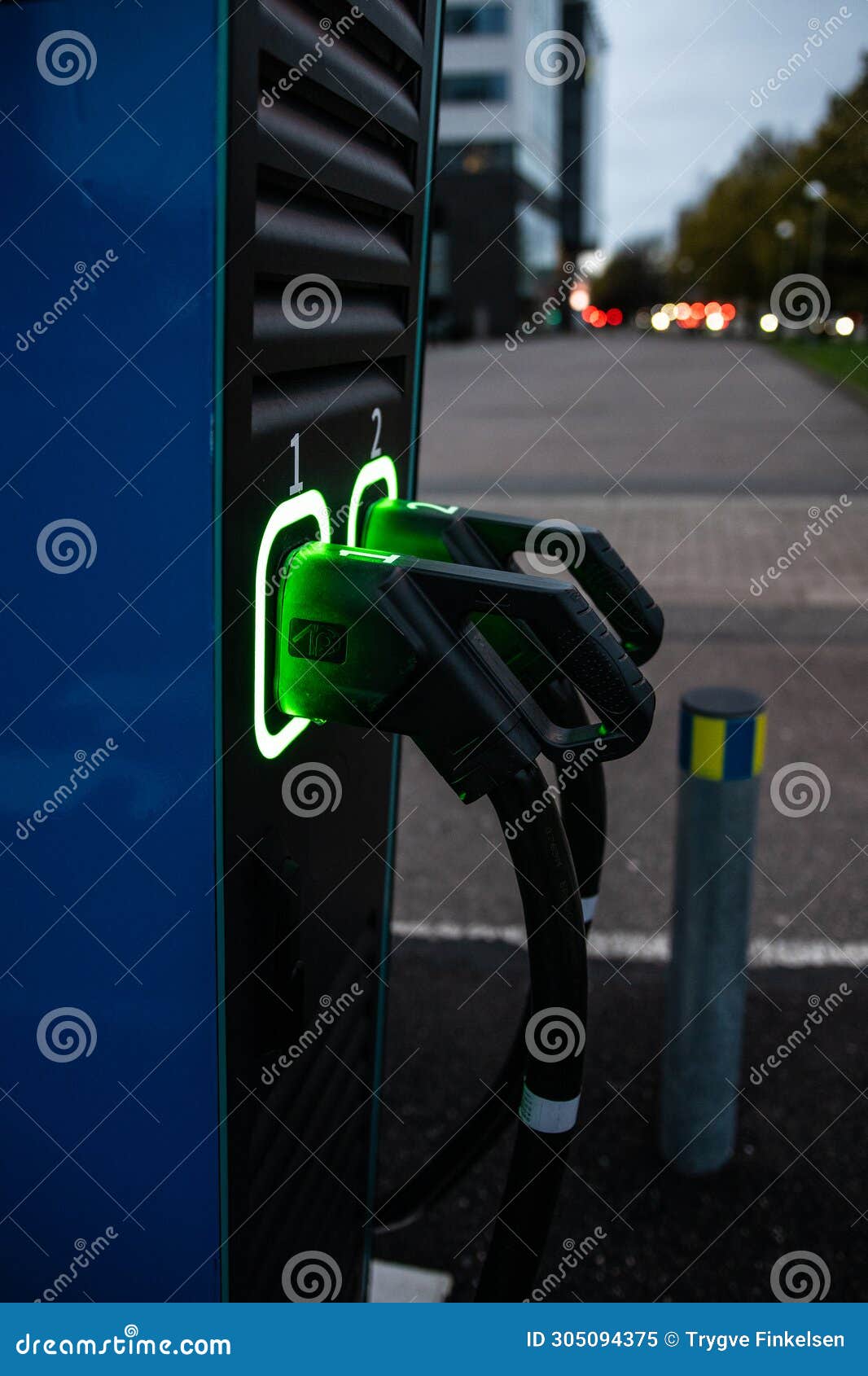 Two Charging Handles of an Electric Car Charger.. Stock Image - Image ...