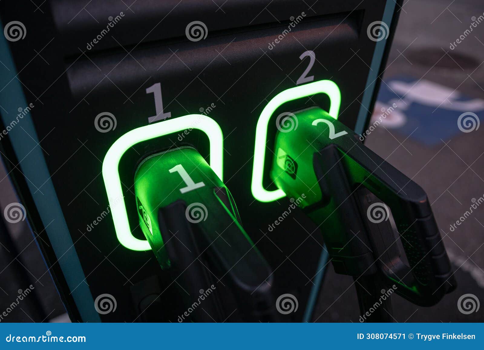 Two Charging Handles of an Electric Car Charger.. Stock Image - Image ...
