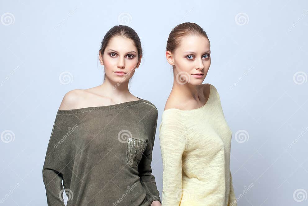 Two Charming Models Posing in Casual Clothes Stock Photo - Image of ...