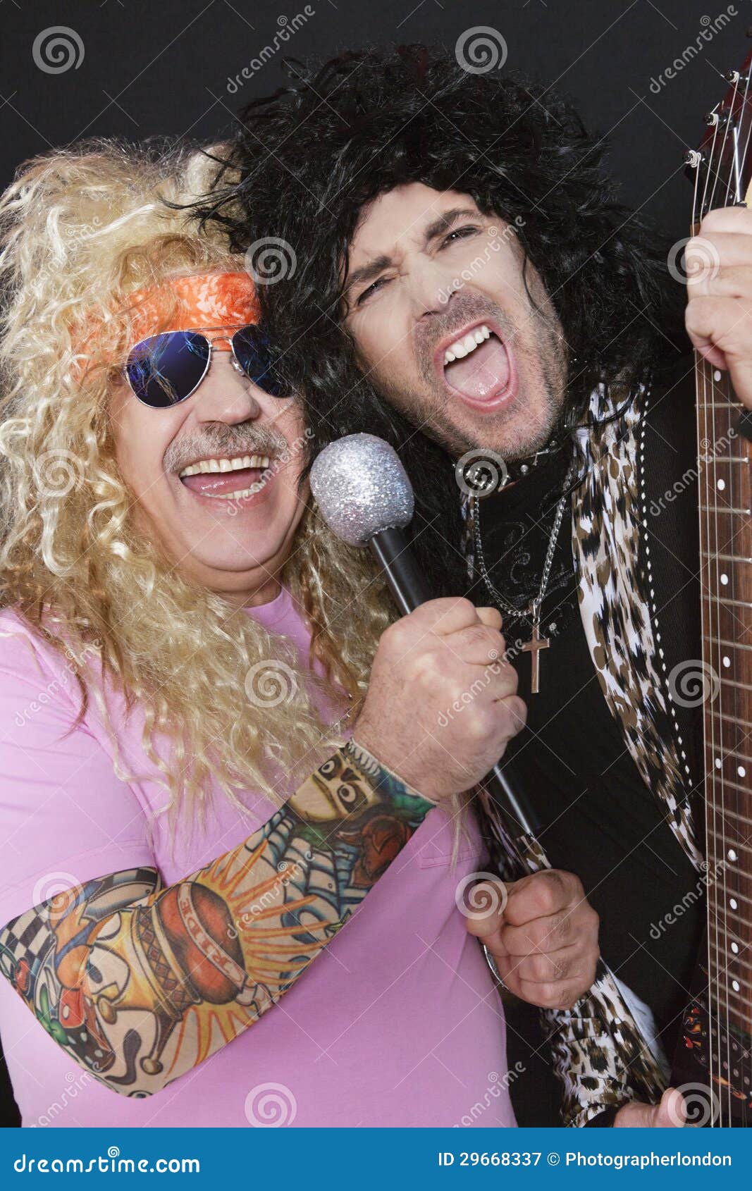 Two Cheerful Male Friends Singing and Playing Guitar Stock Image ...