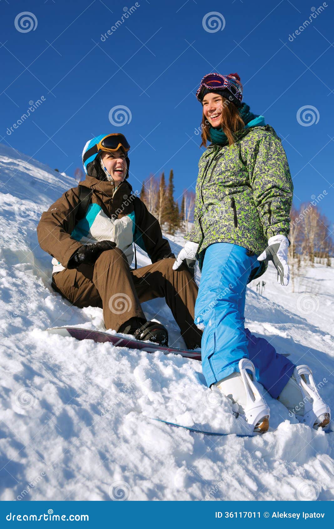 Two cheerful snowboarders stock image. Image of close - 36117011