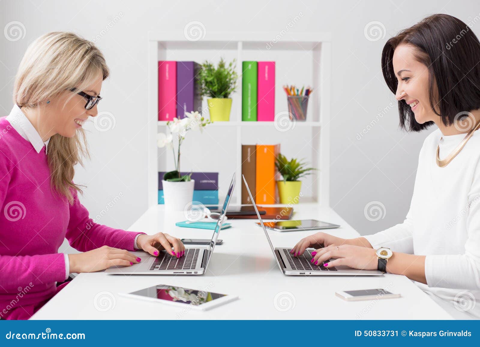 Two Cheerful Woman Working with Computers in the Office Stock Image ...