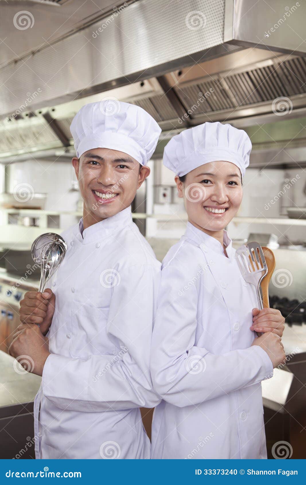 Two Chefs Back to Back stock photo. Image of adult, chinese - 33373240