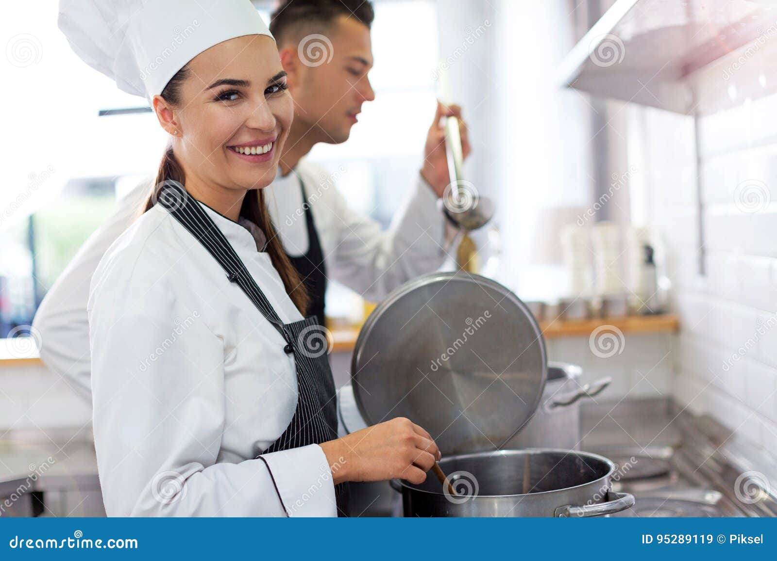 Two chefs in kitchen stock image. Image of food, catering - 95289119