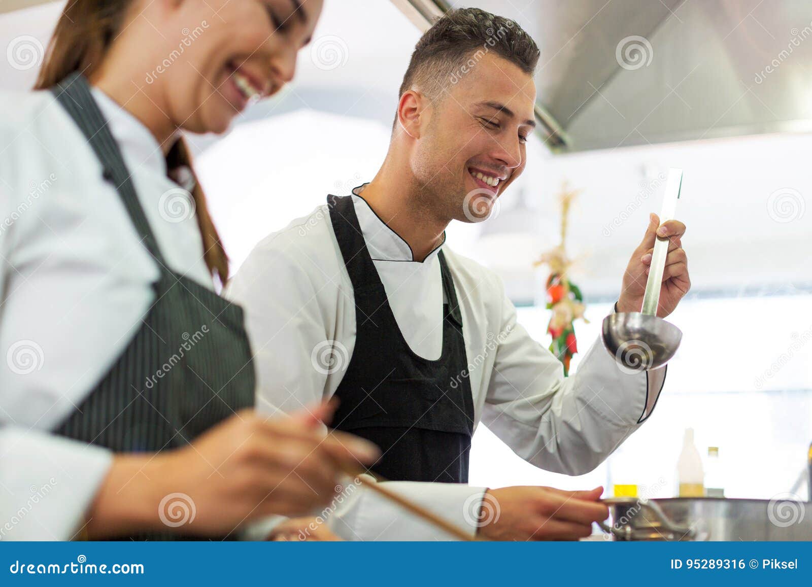 Two chefs in kitchen stock photo. Image of male, confident - 95289316
