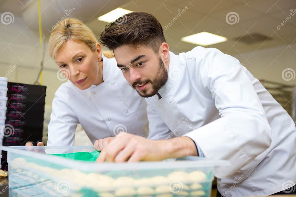 Two Chefs in Kitchen Smiling Stock Image - Image of confectionery ...