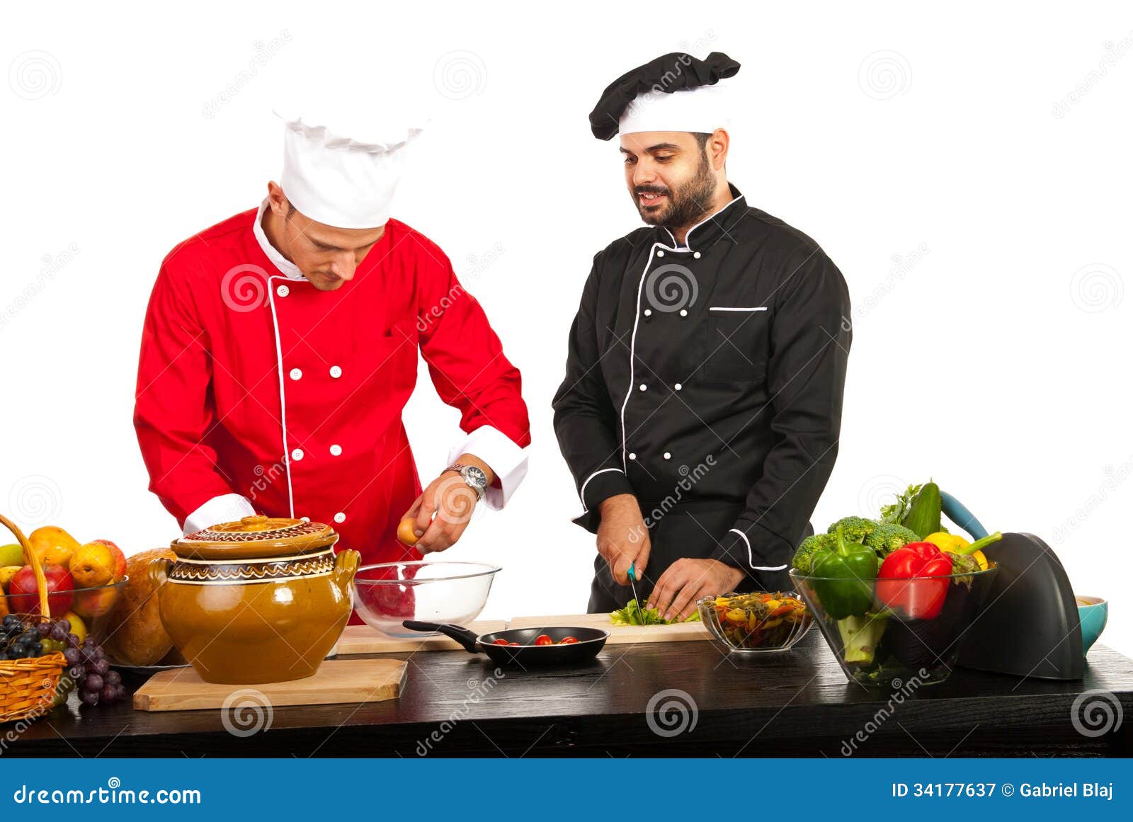 Two chefs preparing food stock image. Image of confident - 34177637