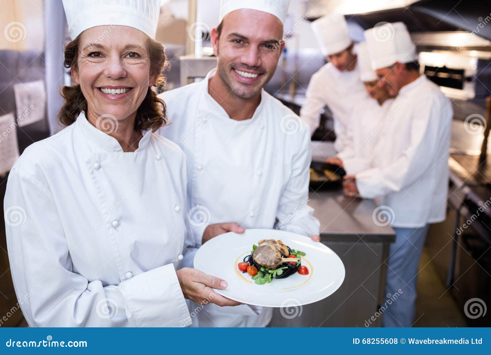 Two Chefs Presenting Their Dishes Stock Photo - Image of colleague ...