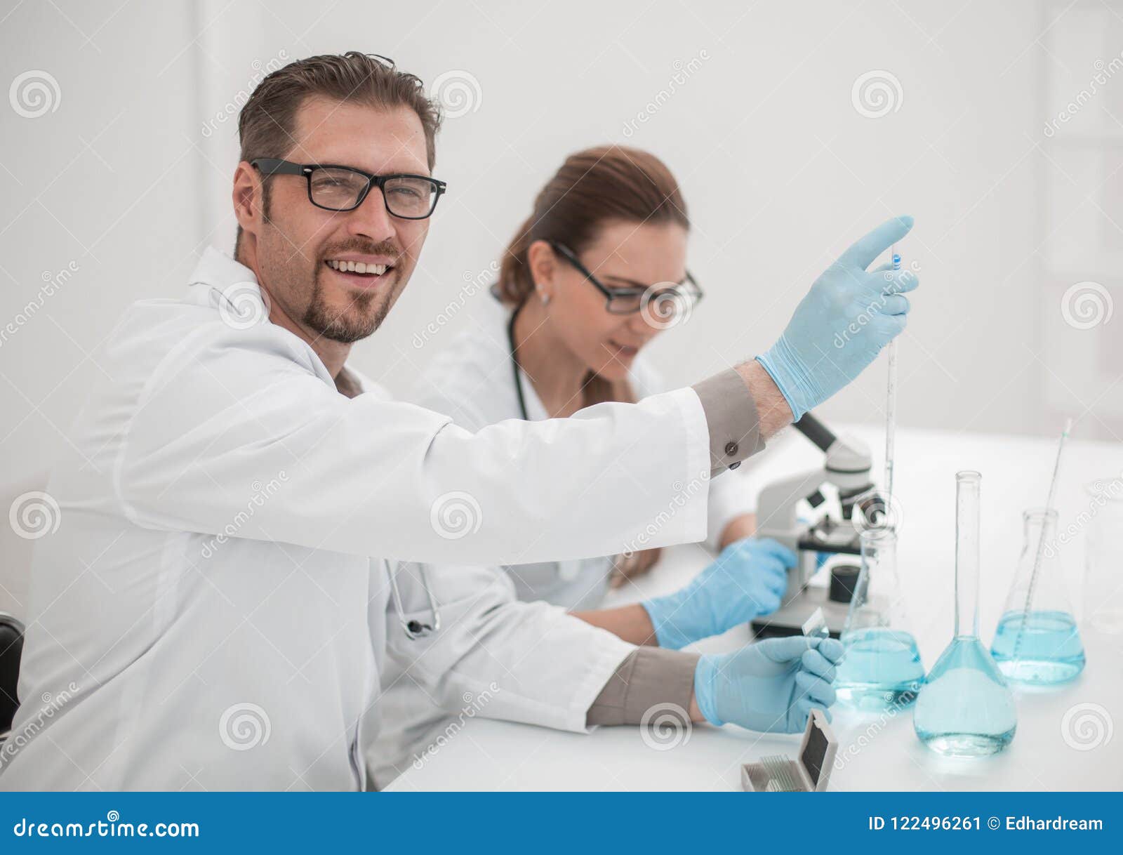 Two Chemist Scientists in the Workplace in the Laboratory Stock Image ...