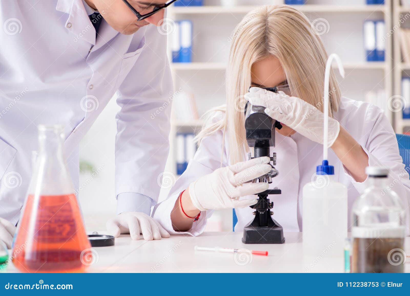 The Two Chemists Having Discussion in Lab Stock Image - Image of liquid ...