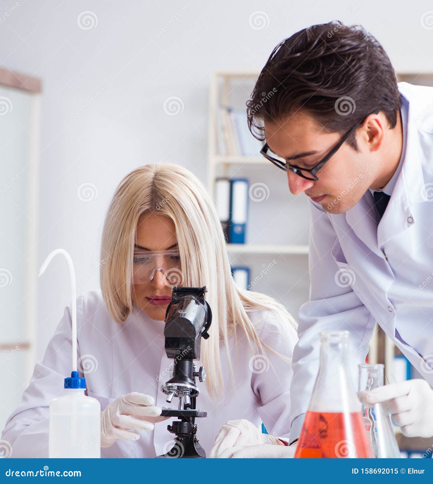 Two Chemists Having Discussion in Lab Stock Image - Image of glass ...