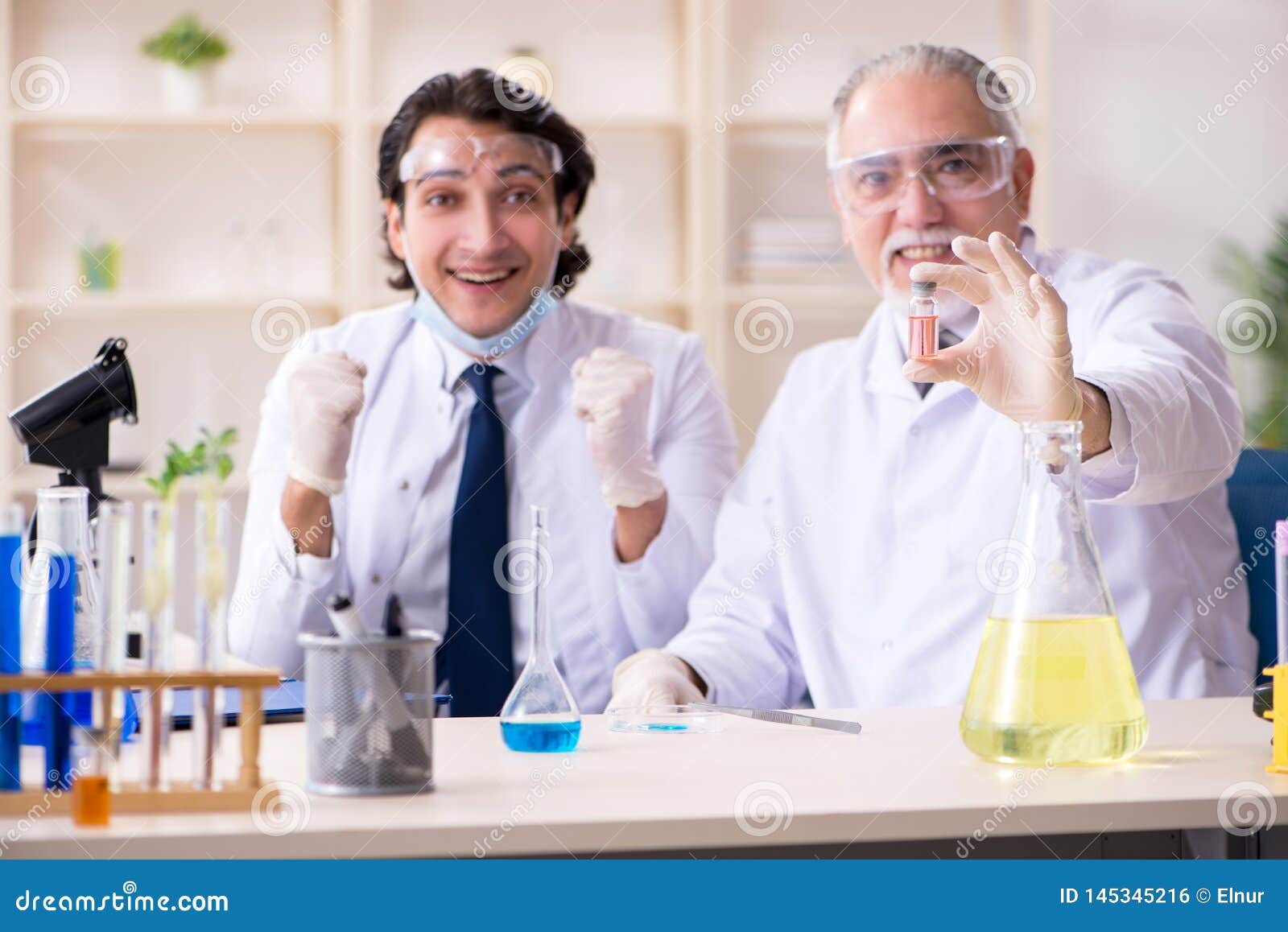 The Two Chemists Working in the Lab Stock Photo - Image of experienced ...