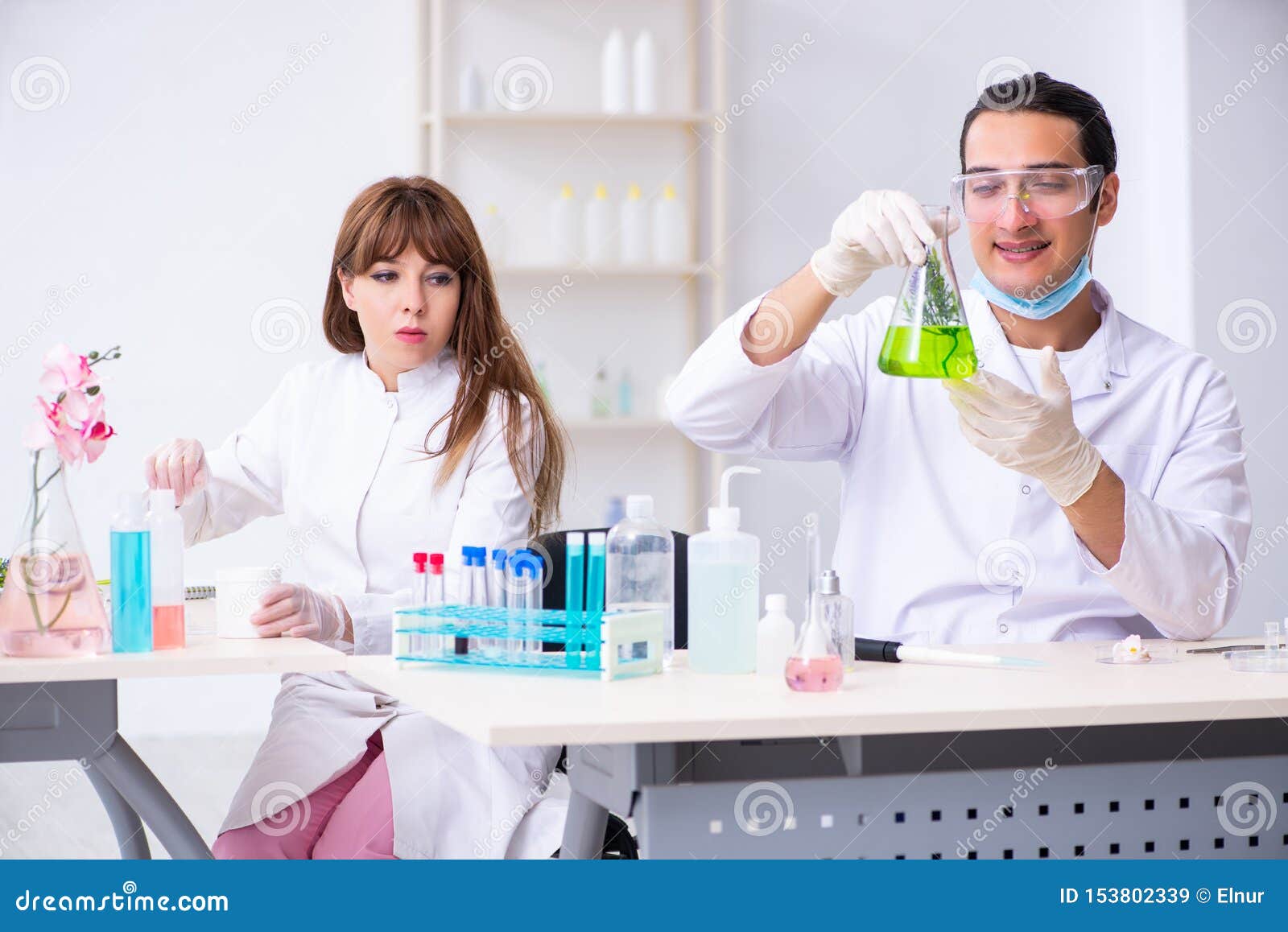 Two Chemists Working in the Lab Stock Image - Image of analyzing, aroma ...