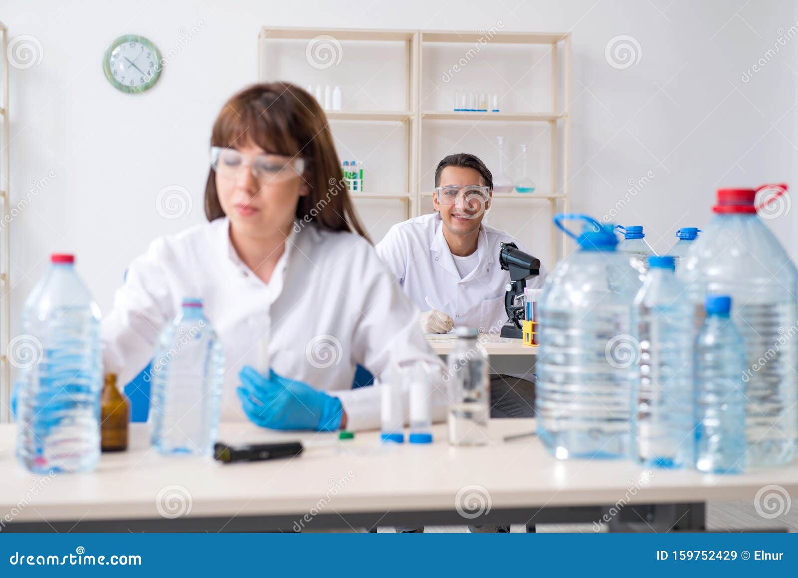 Two Chemists Working in the Lab Stock Image - Image of filtered ...