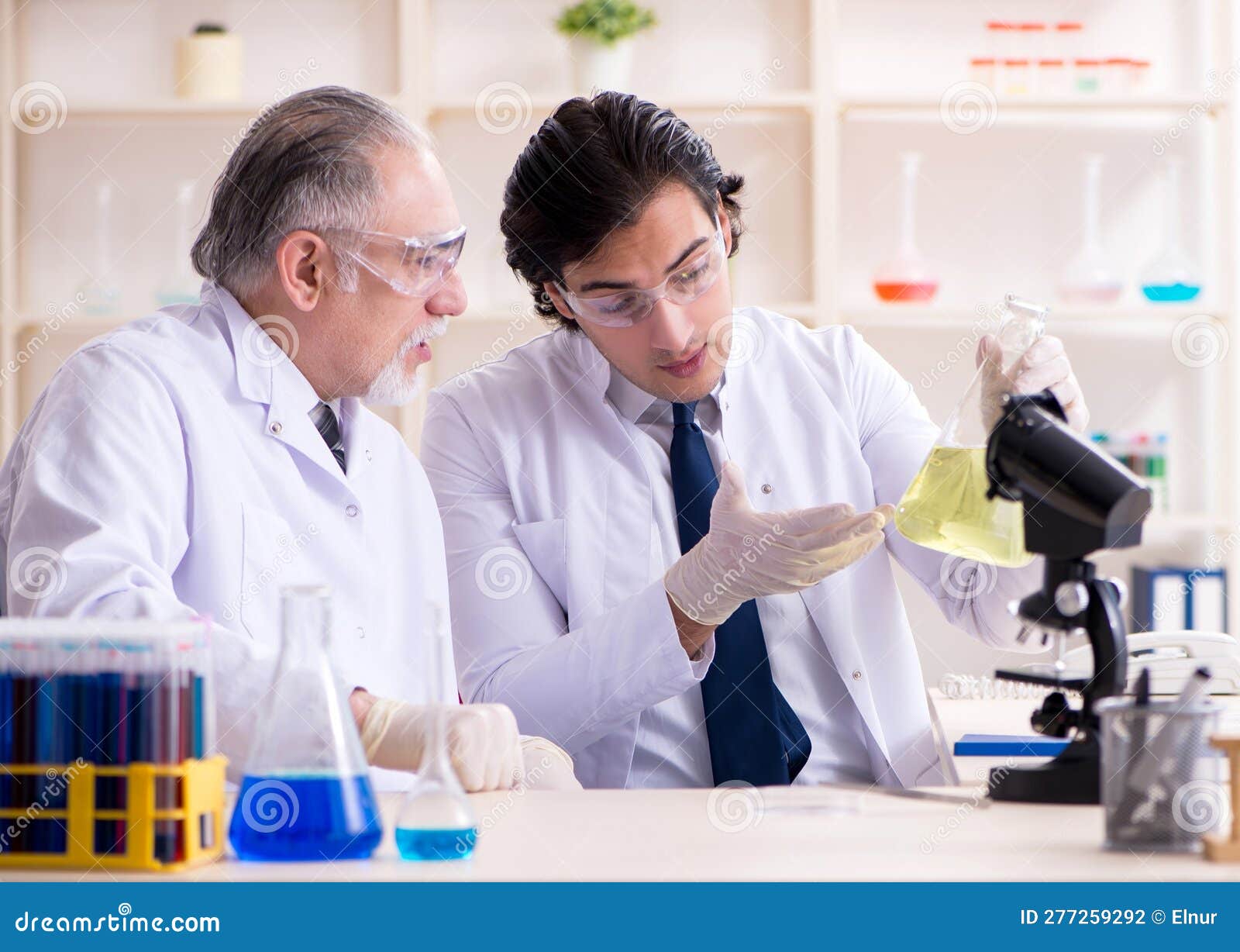 Two Chemists Working in the Lab Stock Photo - Image of microbiology ...