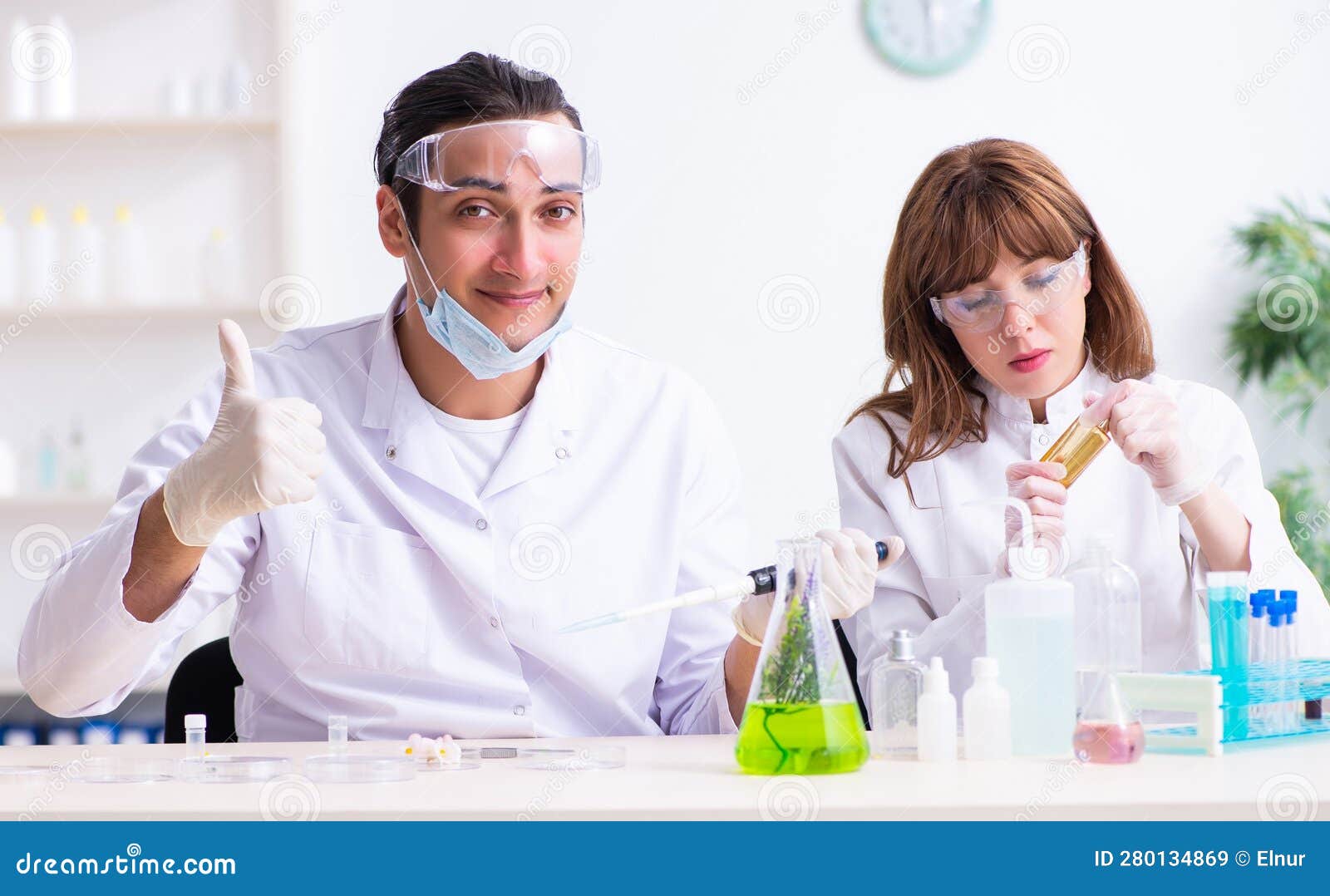 Two Chemists Working in the Lab Stock Image - Image of bottle, perfume ...