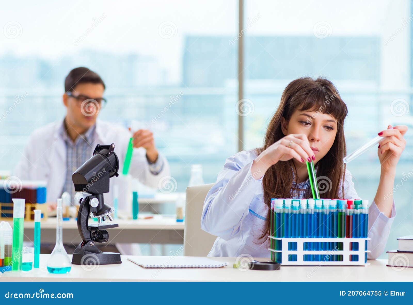 Two Chemists Working in Lab Experimenting Stock Image - Image of class ...