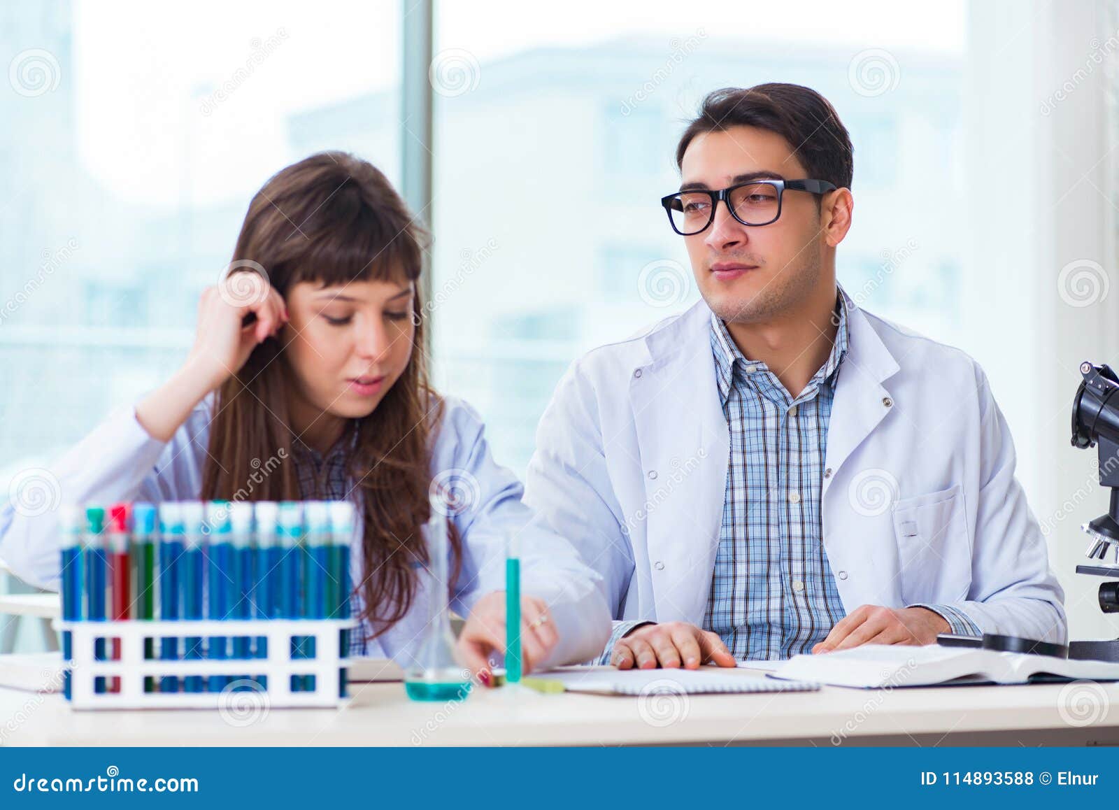 The Two Chemists Working in Lab Experimenting Stock Photo - Image of ... The Two Chemists Working in Lab Experimenting Stock Photo - Image of ...