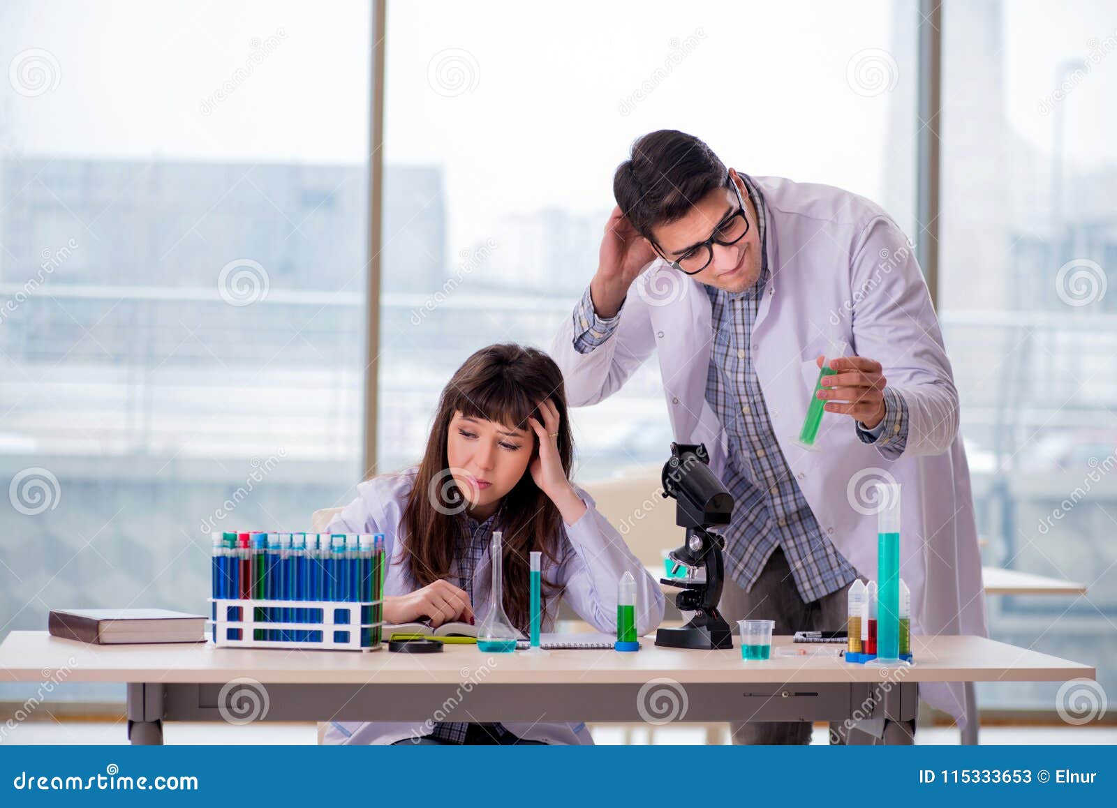 The Two Chemists Working in Lab Experimenting Stock Image - Image of ...