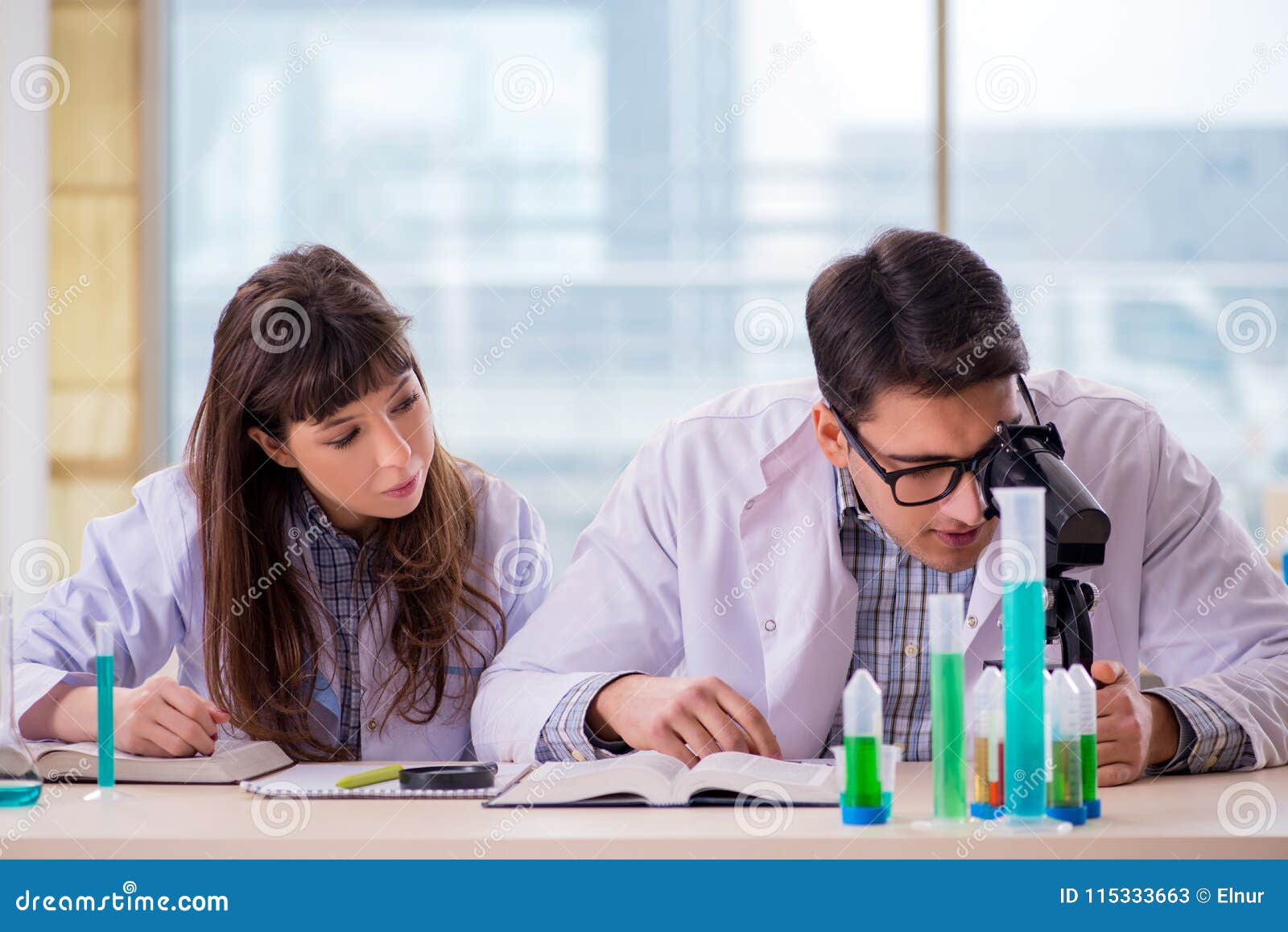 The Two Chemists Working in Lab Experimenting Stock Image - Image of ...