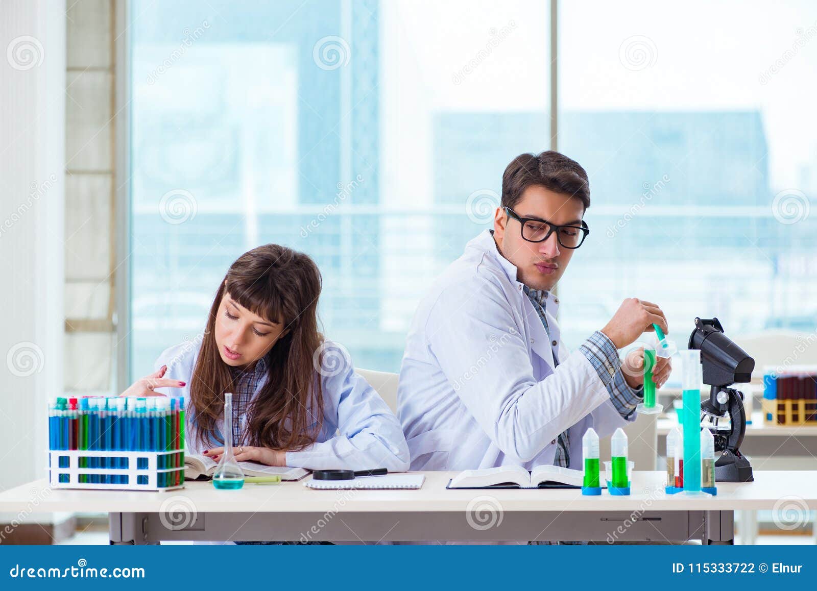 The Two Chemists Working in Lab Experimenting Stock Photo - Image of ... The Two Chemists Working in Lab Experimenting Stock Photo - Image of ...