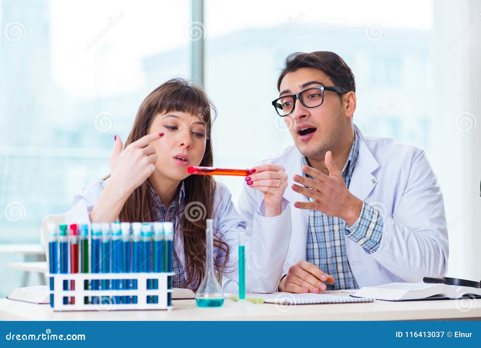 The Two Chemists Working in Lab Experimenting Stock Image - Image of ...