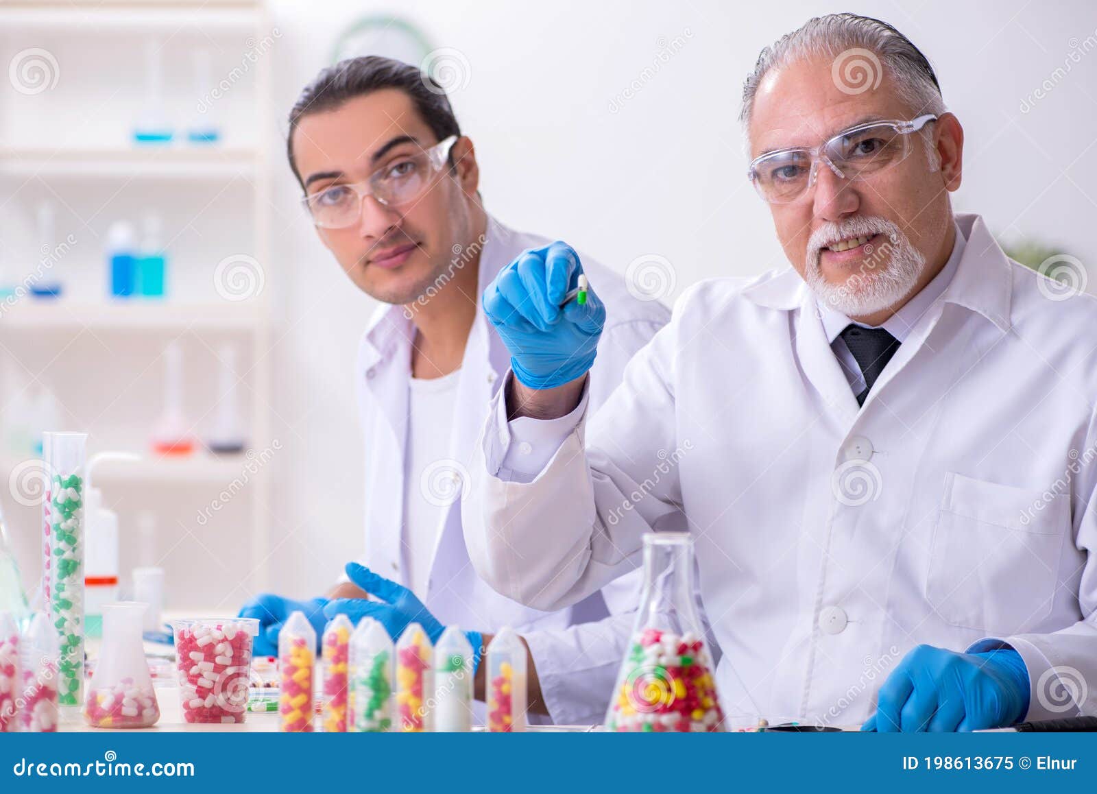Two Chemists Working in the Lab Stock Image - Image of painkiller ...