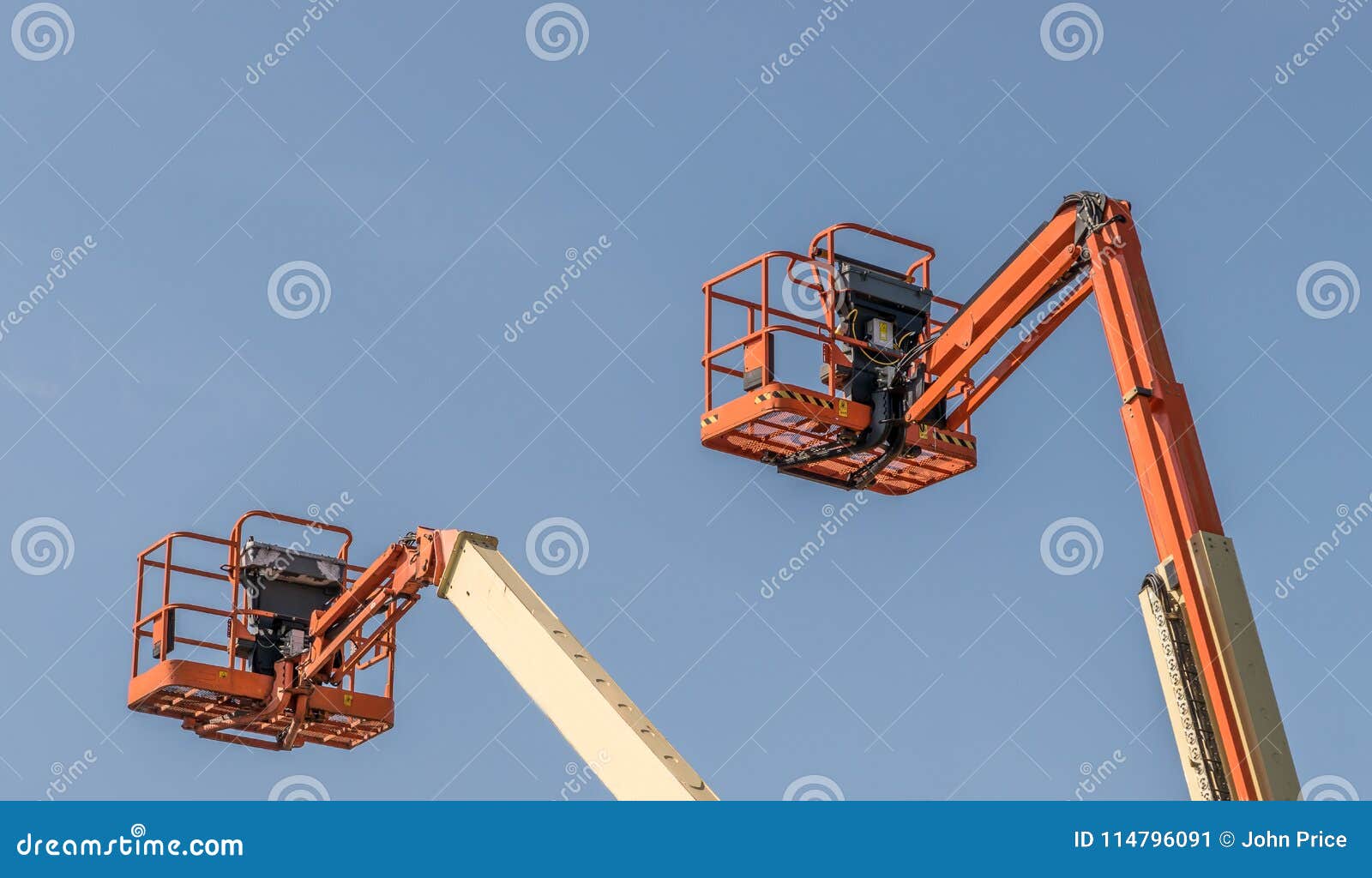 Two Cherry Picker Machines stock image. Image of outdoor - 114796091