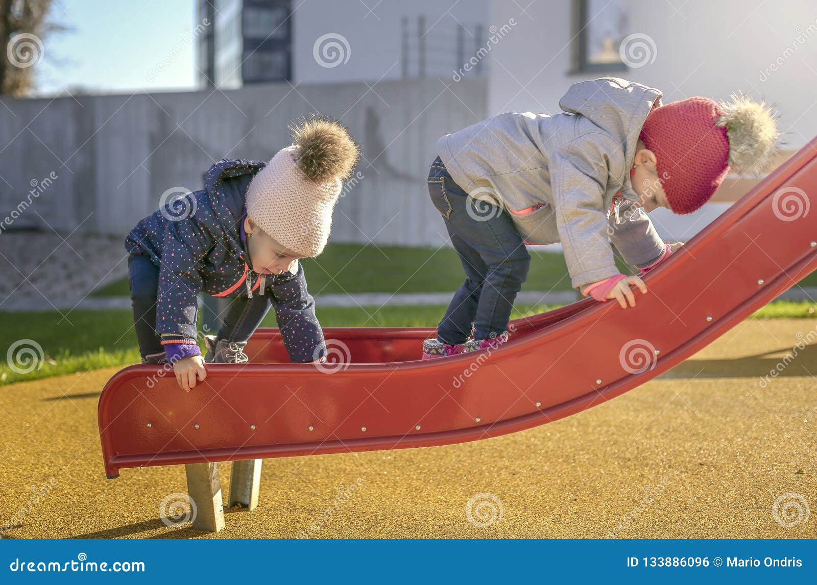 Two Children in Autumn Fall on the Playground Stock Photo - Image of ...
