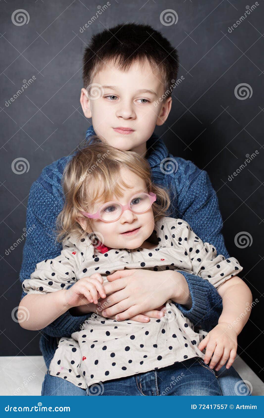 Two Children stock image. Image of portrait, dark, background - 72417557