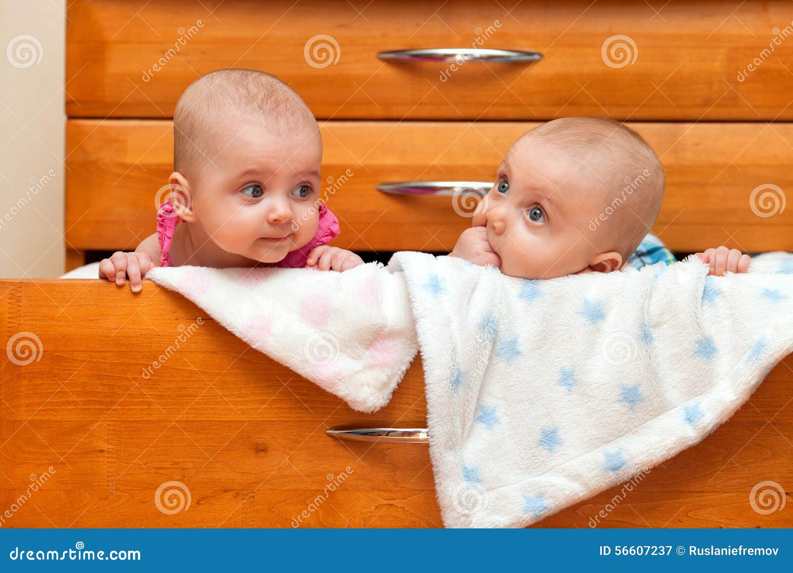 Two children in the chest stock image. Image of twins - 56607237