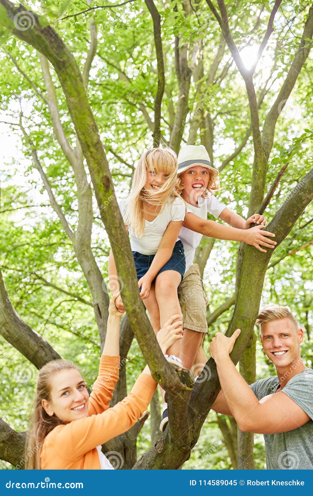 Two Children Climb on a Tree Stock Image - Image of play, male: 114589045