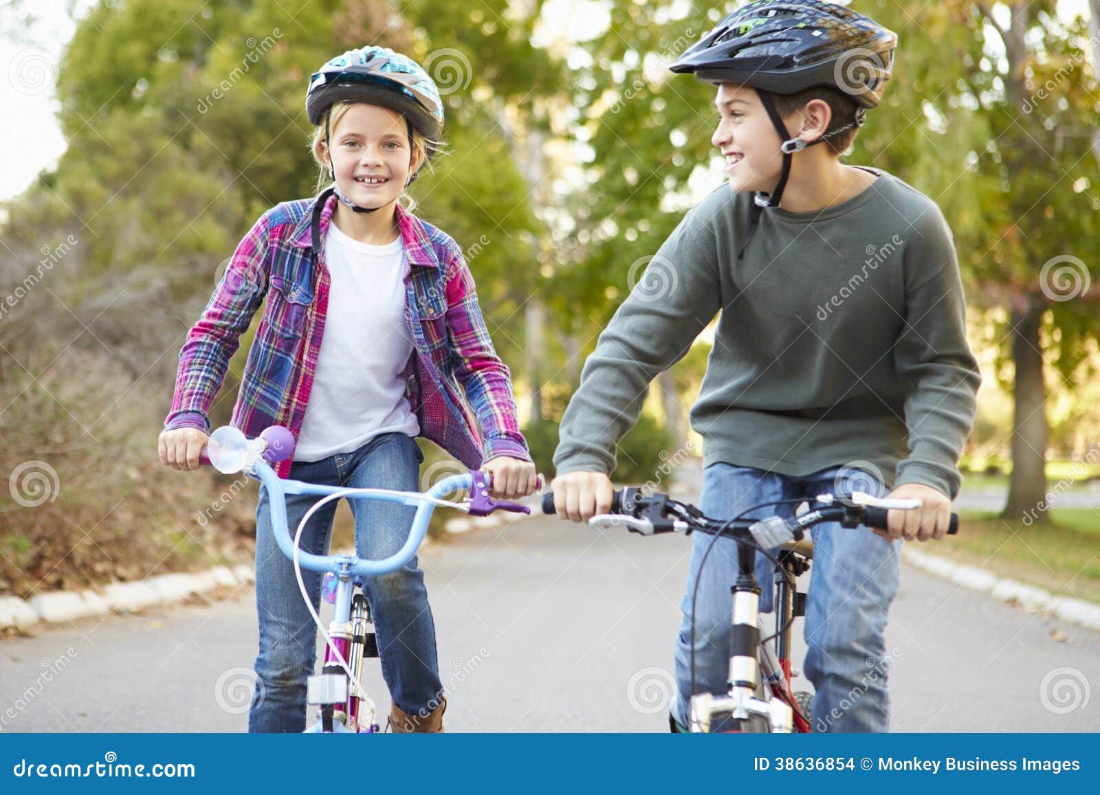 Two Children on Cycle Ride in Countryside Stock Photo - Image of road ...