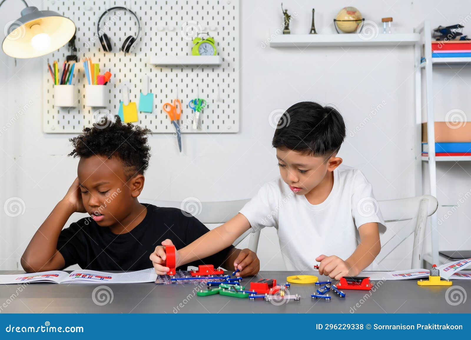 Two Children of Different Ethnicities are Confused Learning about ...