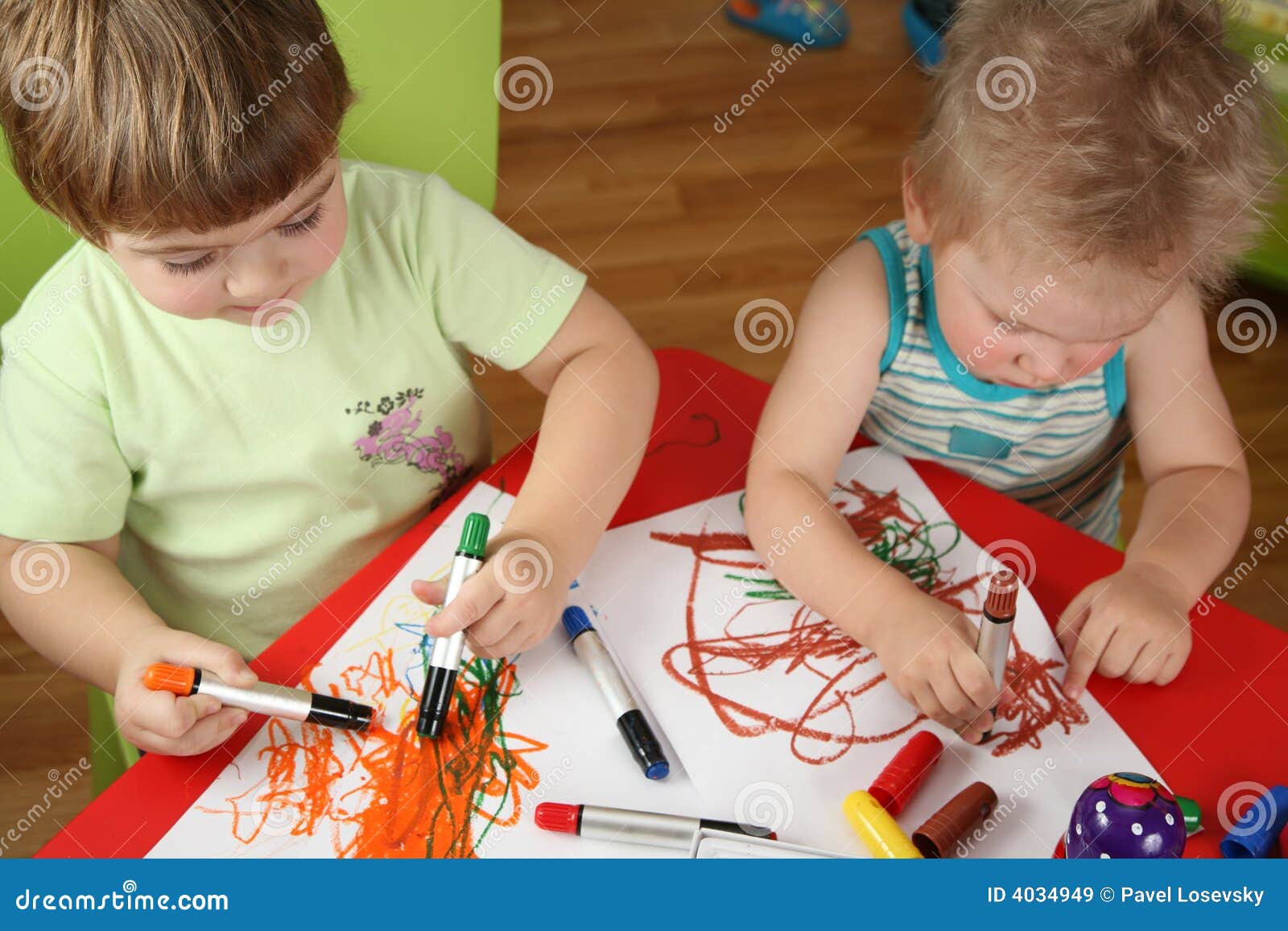 Two children drawing stock image. Image of casual, beautiful - 4034949