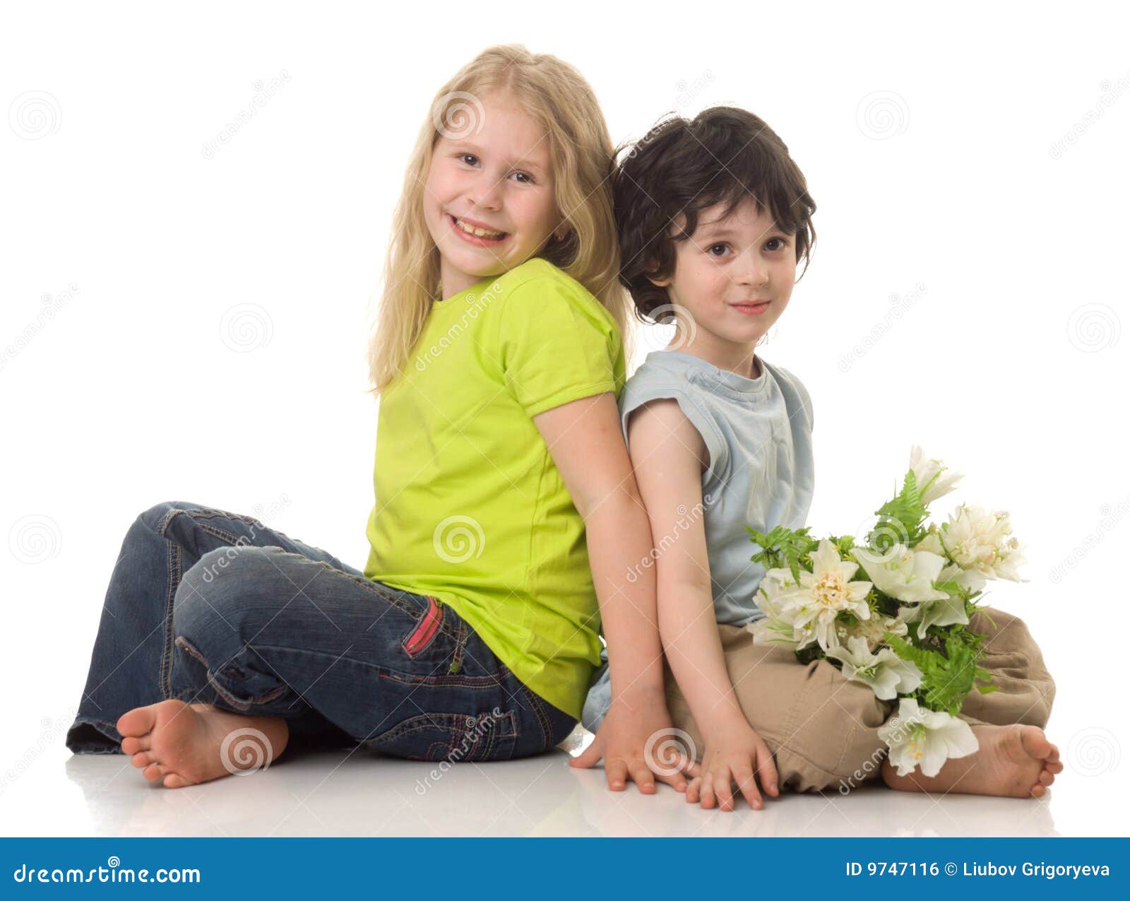 Two children with flowers stock photo. Image of giving - 9747116