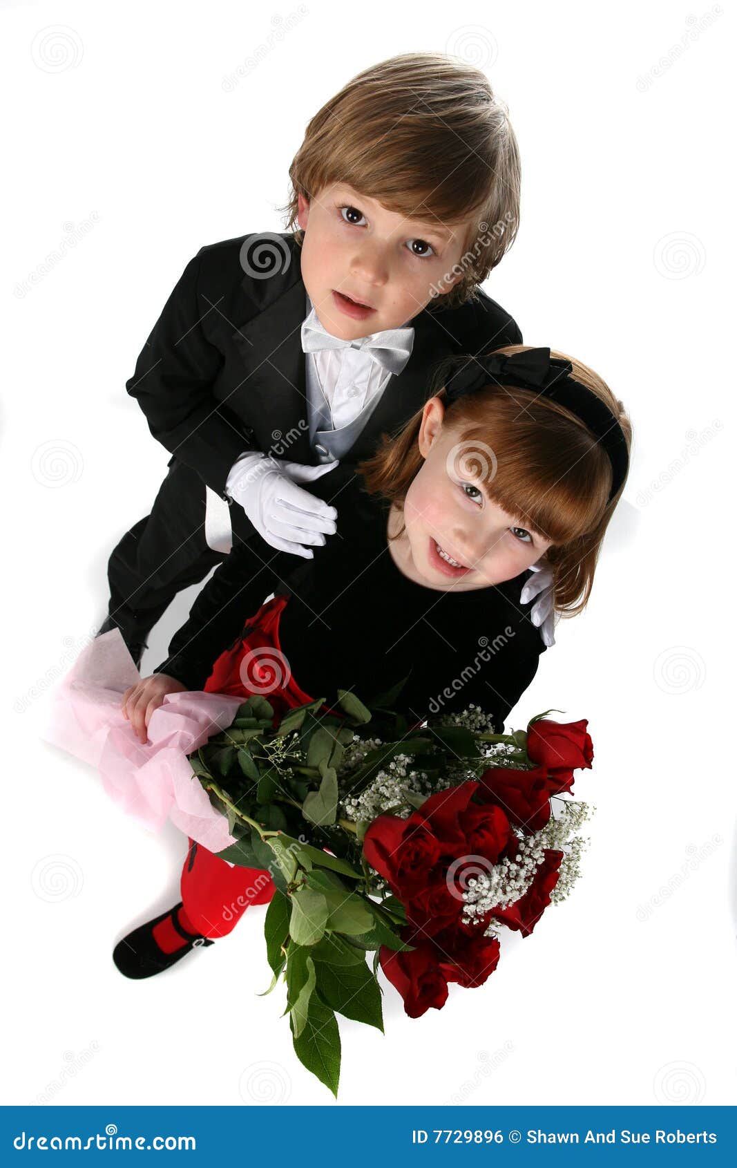 Two Children in Formal Clothing and Red Roses Stock Photo - Image of ...
