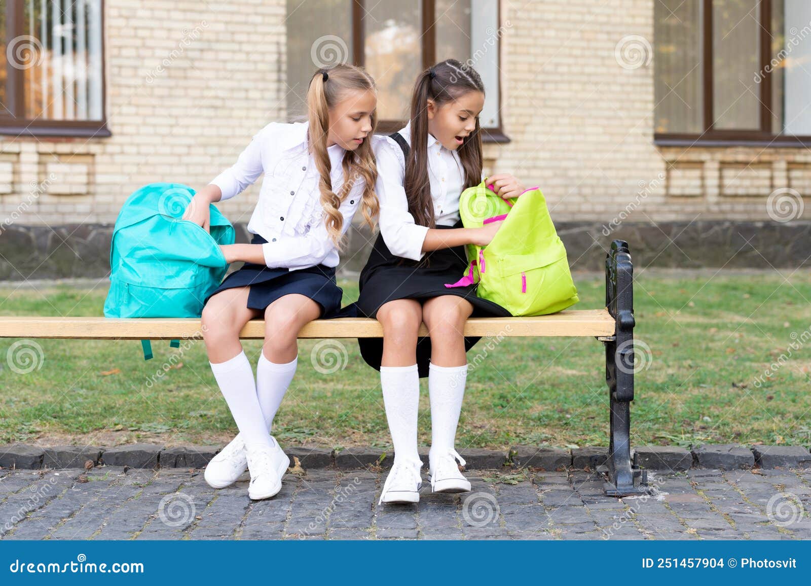 Two Children Friends Sit on Bench with Backpack Together Stock Photo ...