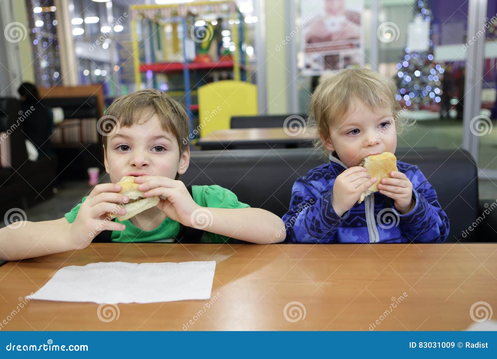 Two Children Have Sandwiches Stock Image - Image of looking, baby: 83031009