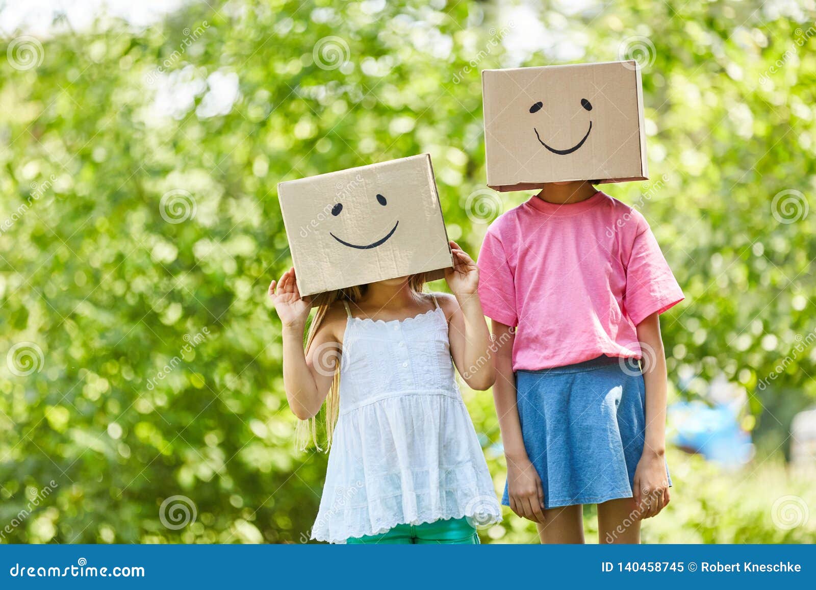 Children Hide Faces Under Cardboard Boxes Stock Image - Image of ...