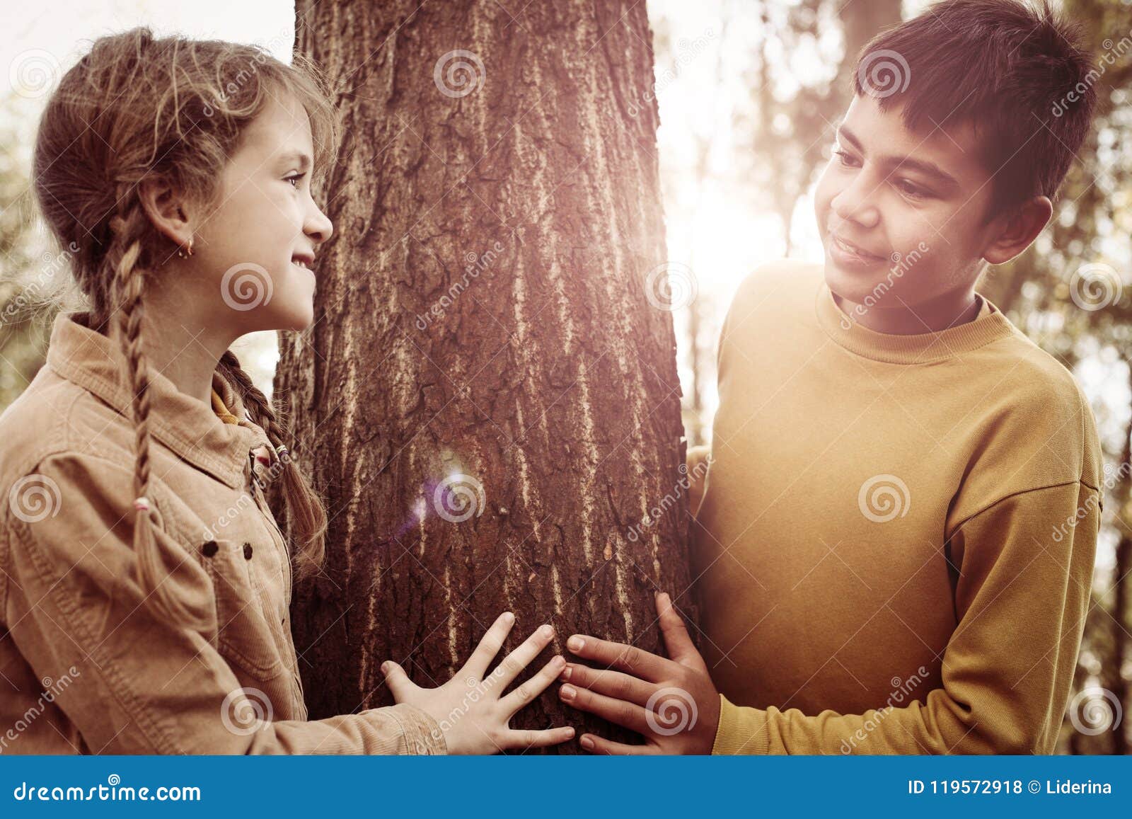 Two children in the park. stock photo. Image of friendship - 119572918