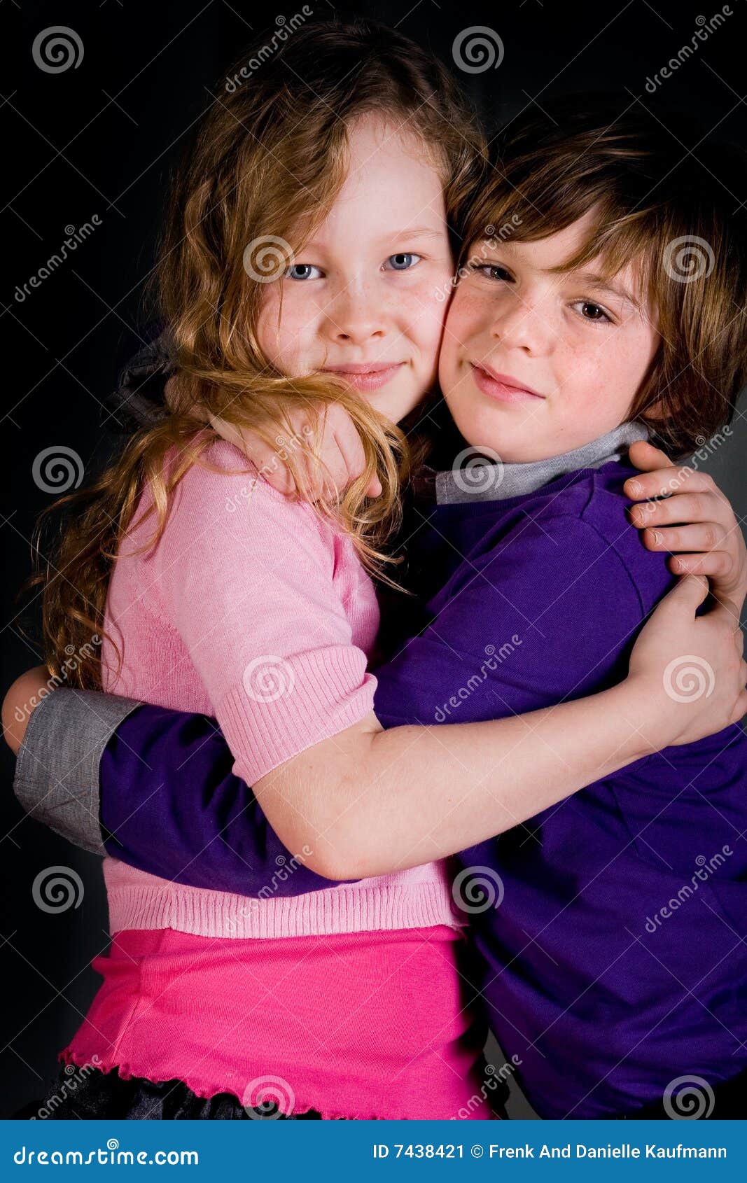 Two children hugging stock image. Image of eight, female - 7438421