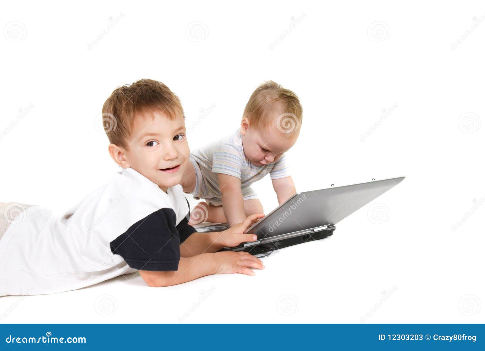 Two children with laptop stock image. Image of isolated - 12303203