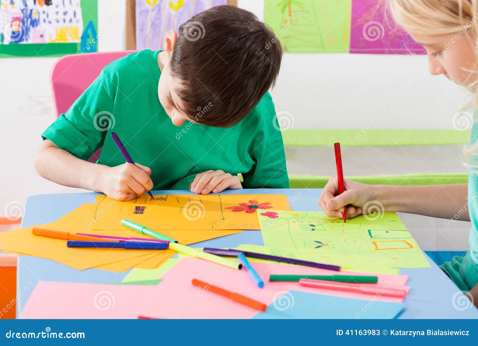 Two children paint markers stock image. Image of girl - 41163983