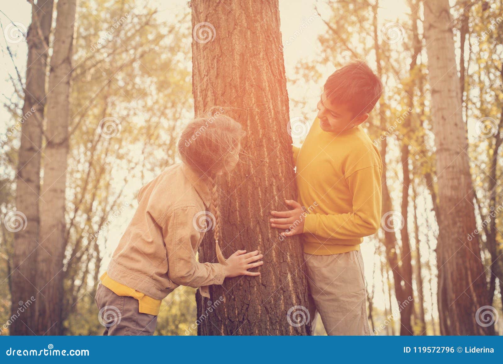 Two children in the park. stock photo. Image of friendship - 119572796