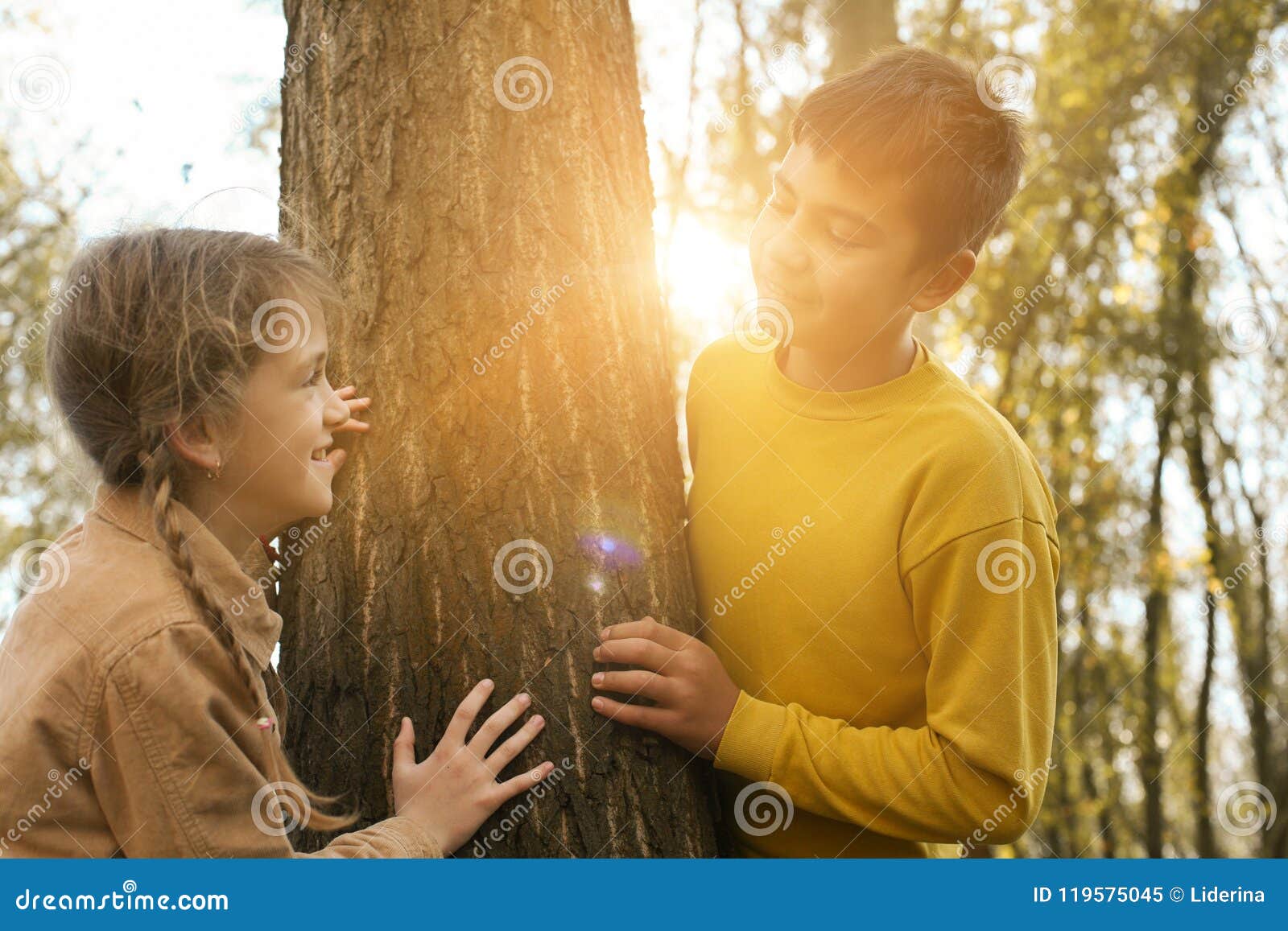 Two children in the park. stock image. Image of brother - 119575045