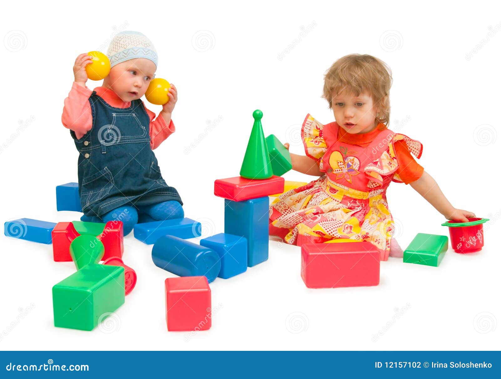 Two children play cubes stock photo. Image of object - 12157102